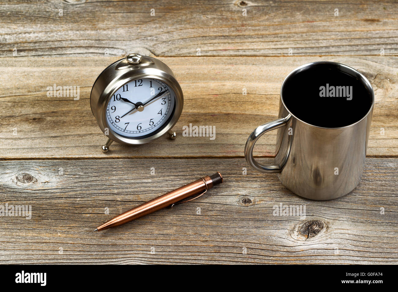 Retro metal work objects on rustic wooden desktop Stock Photo - Alamy