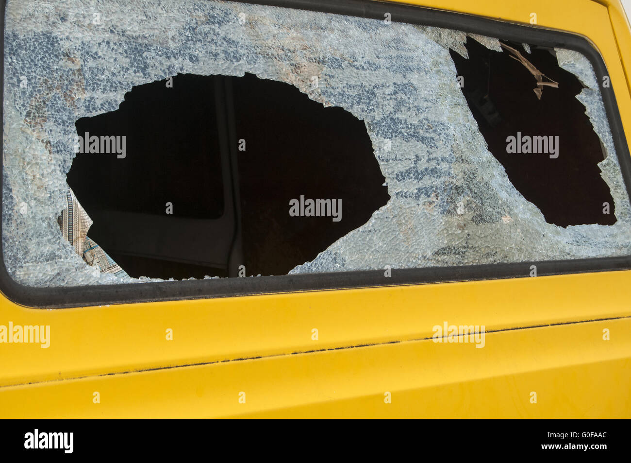 Broken rear window of grunge vintage van Stock Photo - Alamy