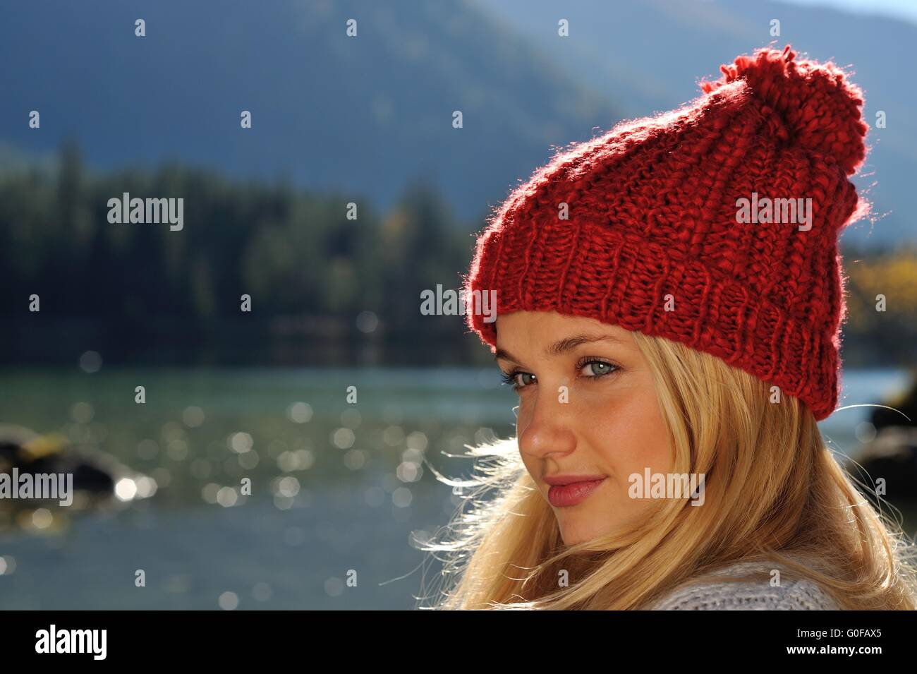 Young woman with red cap Stock Photo - Alamy