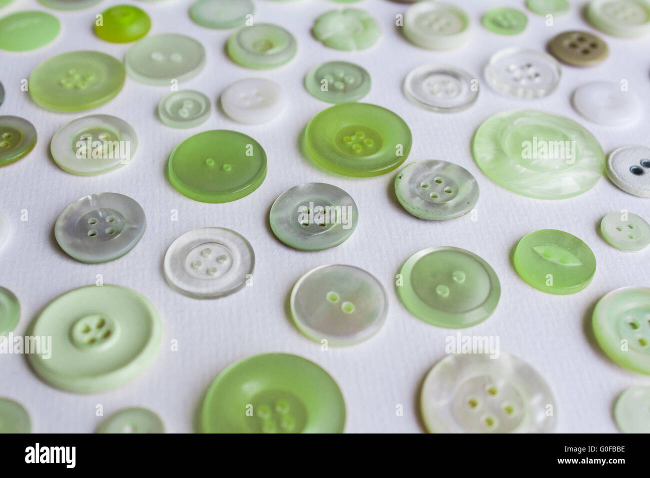 colorful button collection on white background Stock Photo - Alamy