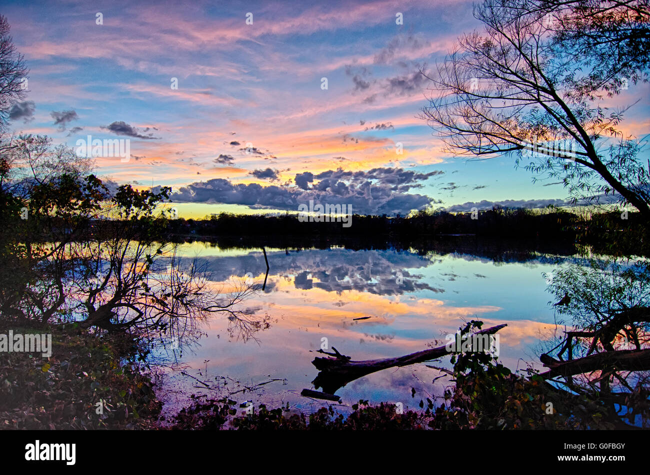 sunset and reflection with beautiful sky rainbow colors Stock Photo - Alamy