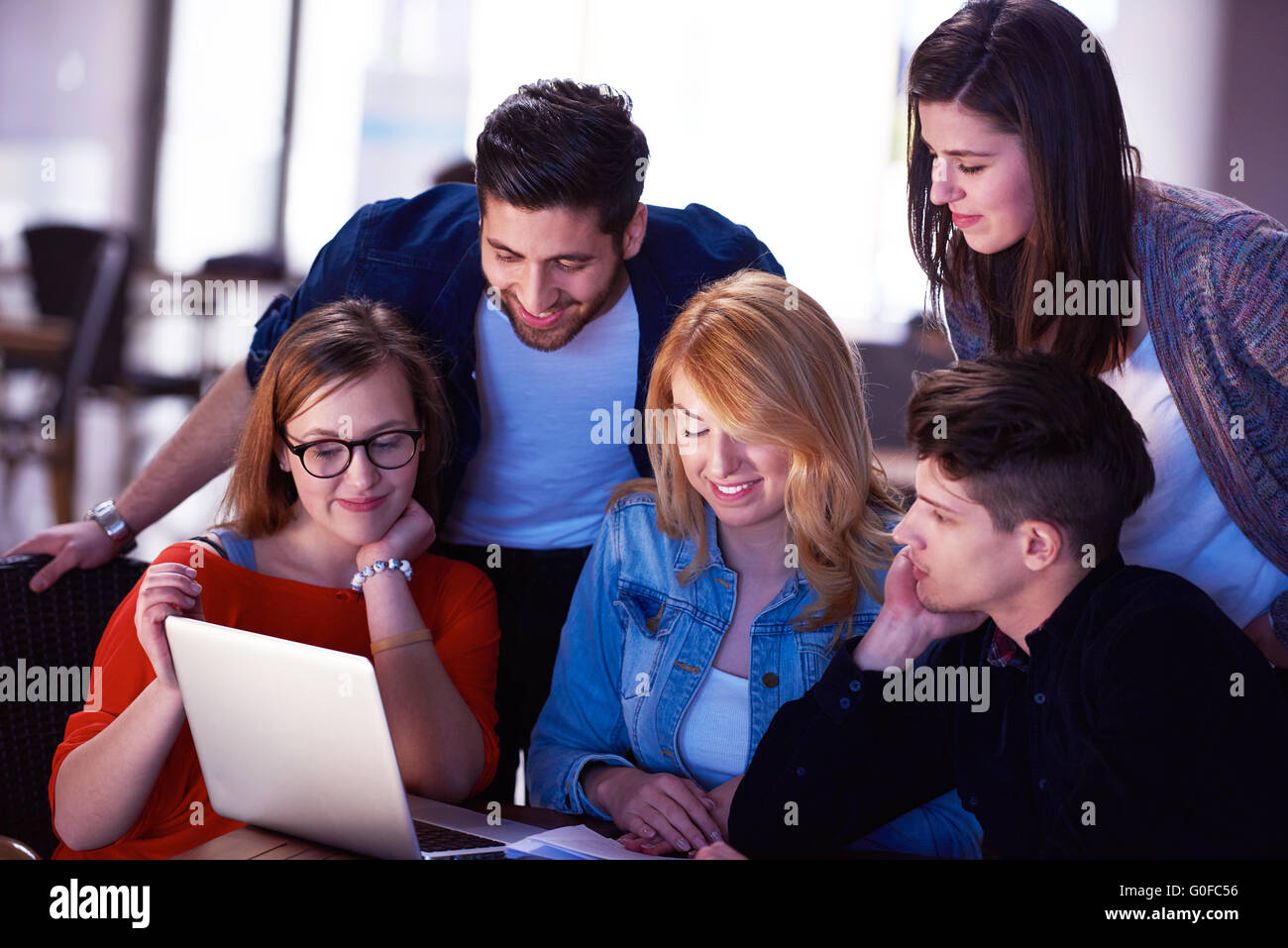 students group working on school project together Stock Photo - Alamy
