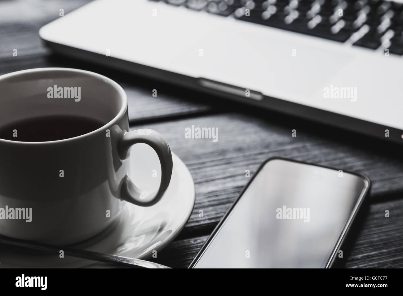 Office table notepad computer tea hi-res stock photography and images ...