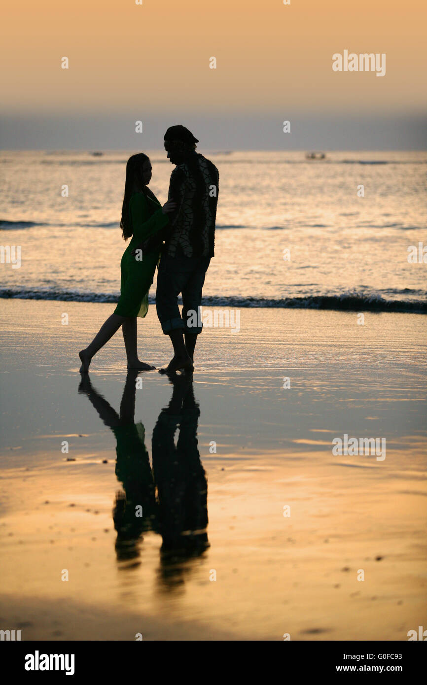 Couple on sunset Stock Photo - Alamy