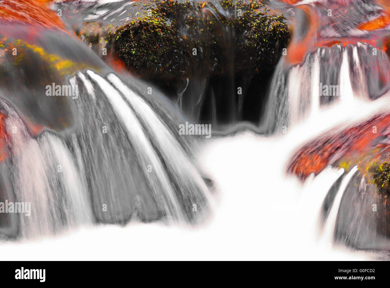 Waterfall in red Stock Photo - Alamy