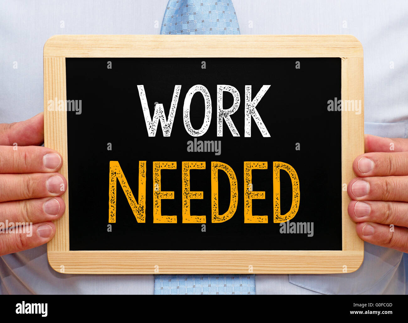 Work needed - Manager with chalkboard Stock Photo - Alamy