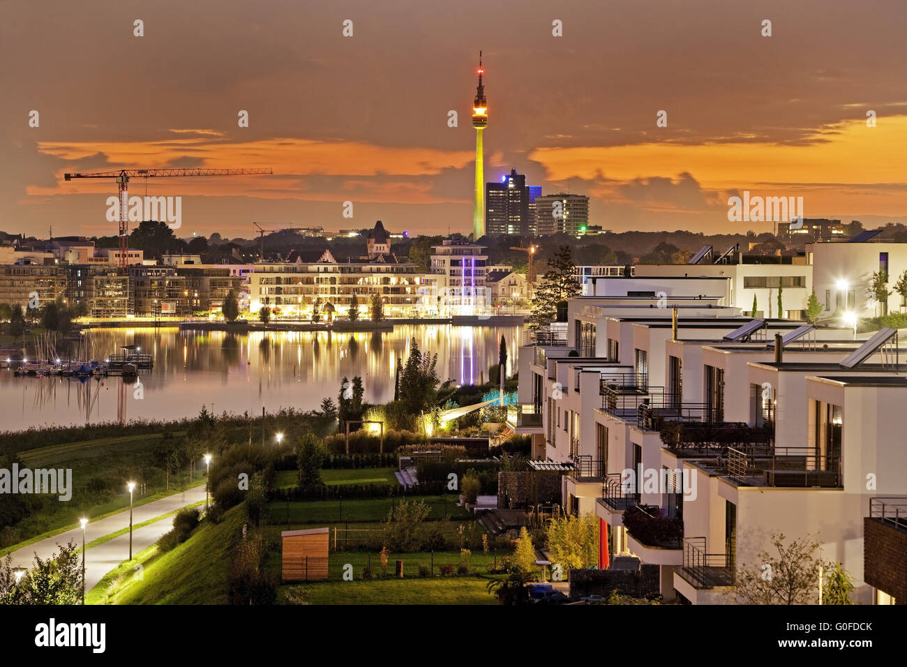 Phoenix Lake with residential areas and the Florian Tower at sunset ...