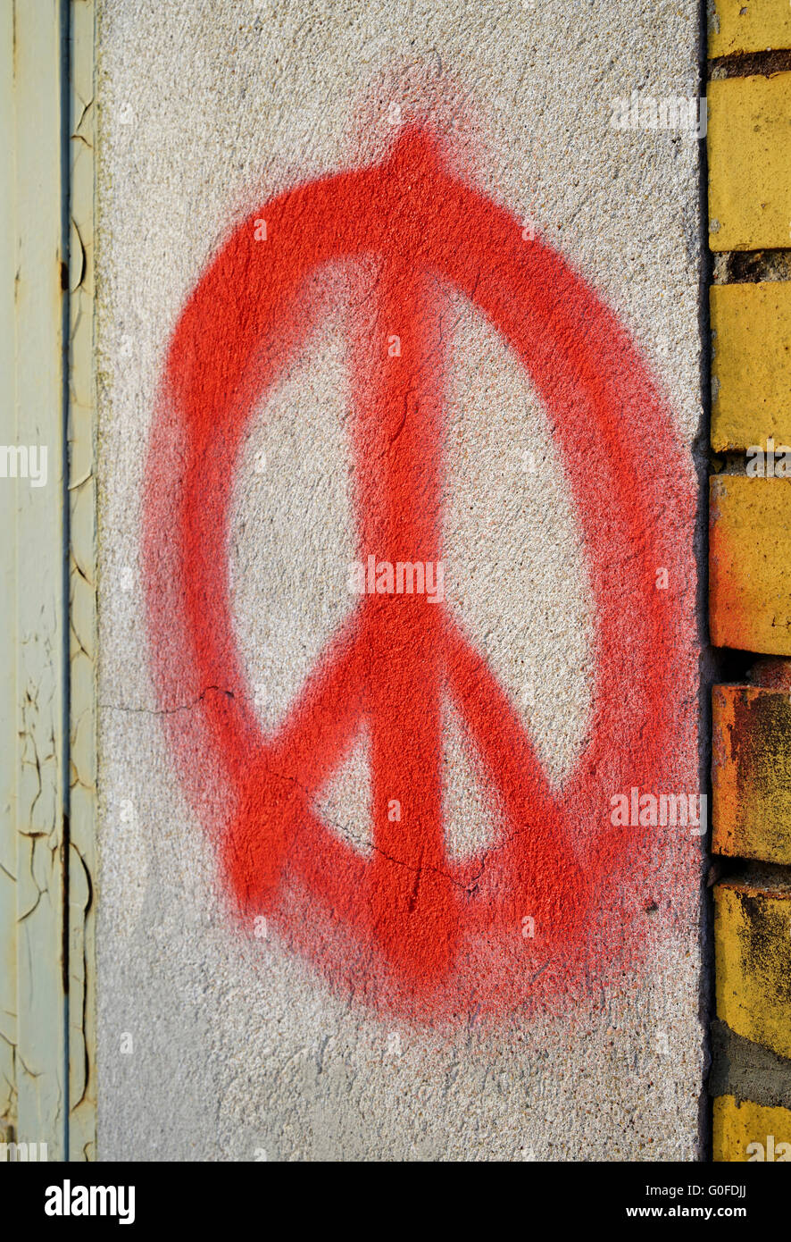 Peace symbol on the facade of a house in Magdeburg Stock Photo - Alamy