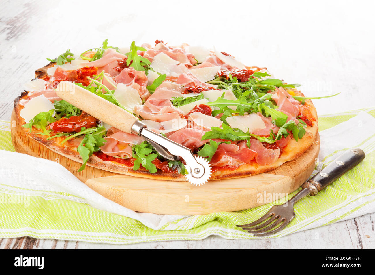 Culinary pizza eating Stock Photo - Alamy