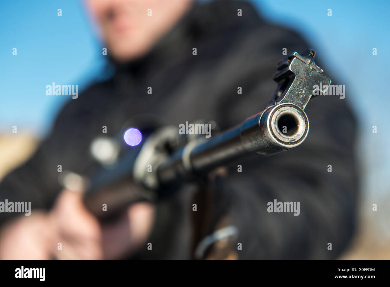 soldier or sniper holding gun with virtual screen projection and aiming ...