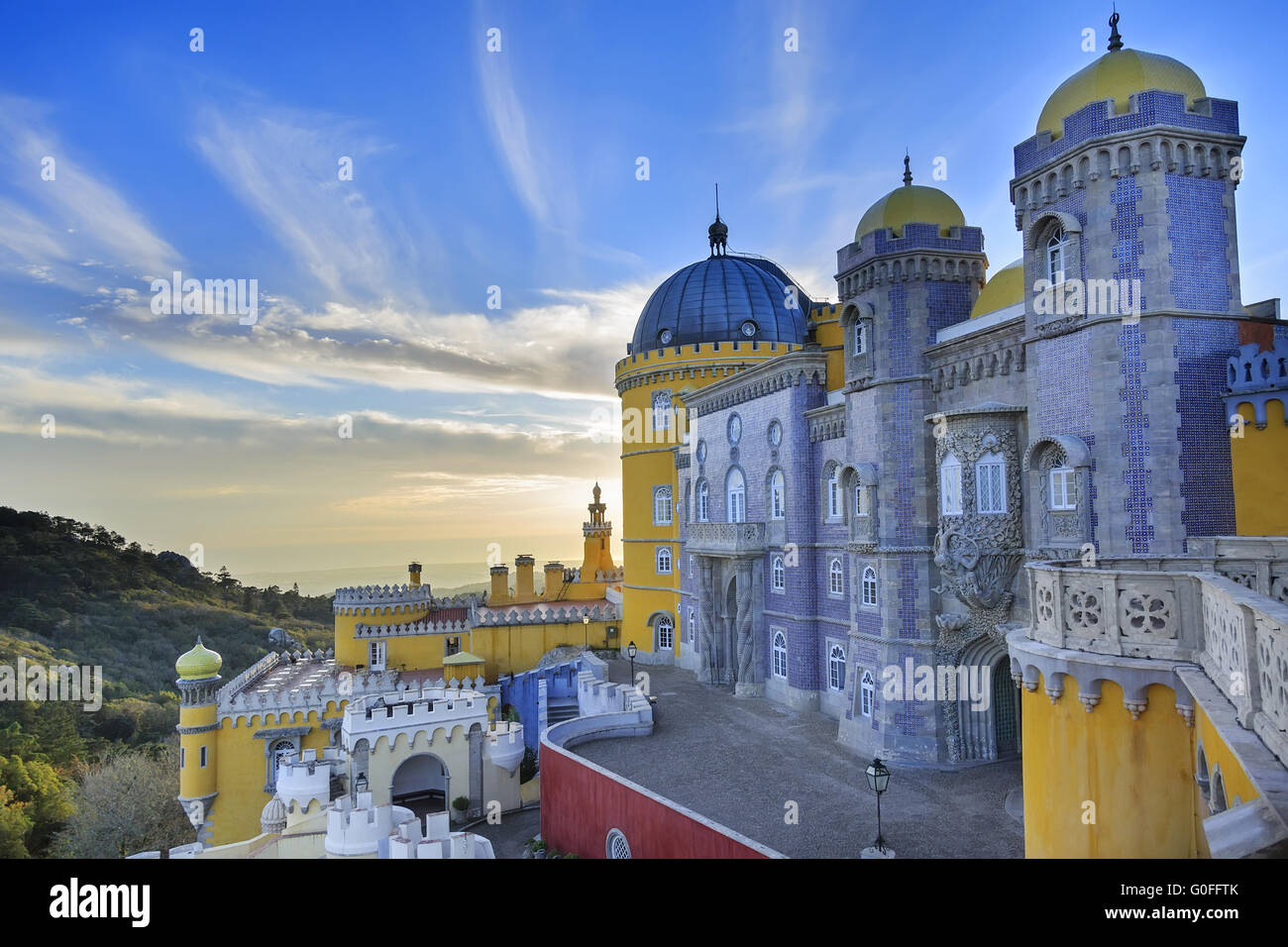Pena castle yellow towers and blue mosaic towers Stock Photo - Alamy