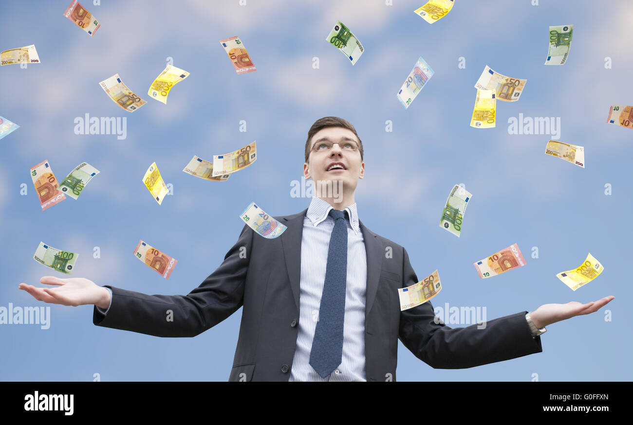 Happy man money rain hi-res stock photography and images - Alamy