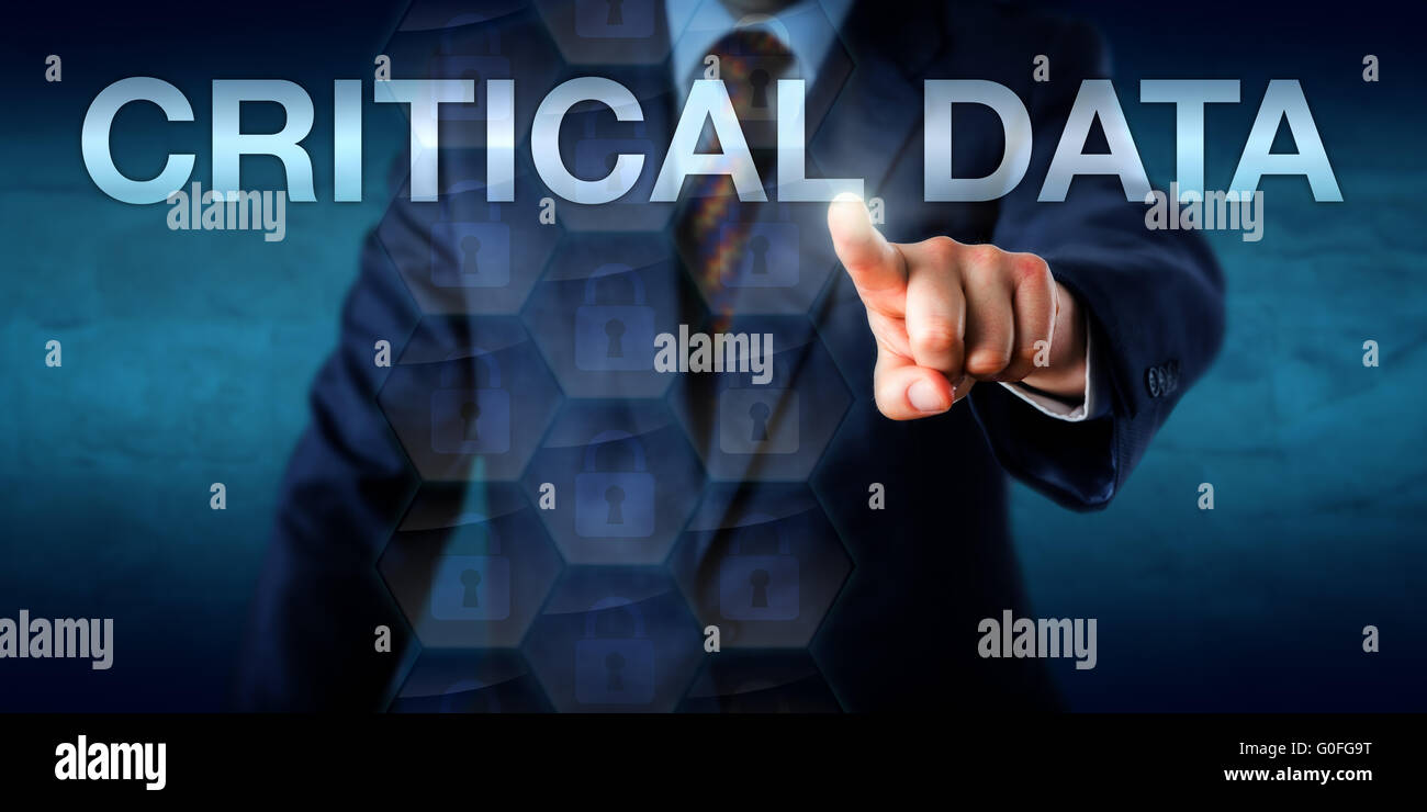 Manager Pushing CRITICAL DATA On A Screen Stock Photo - Alamy