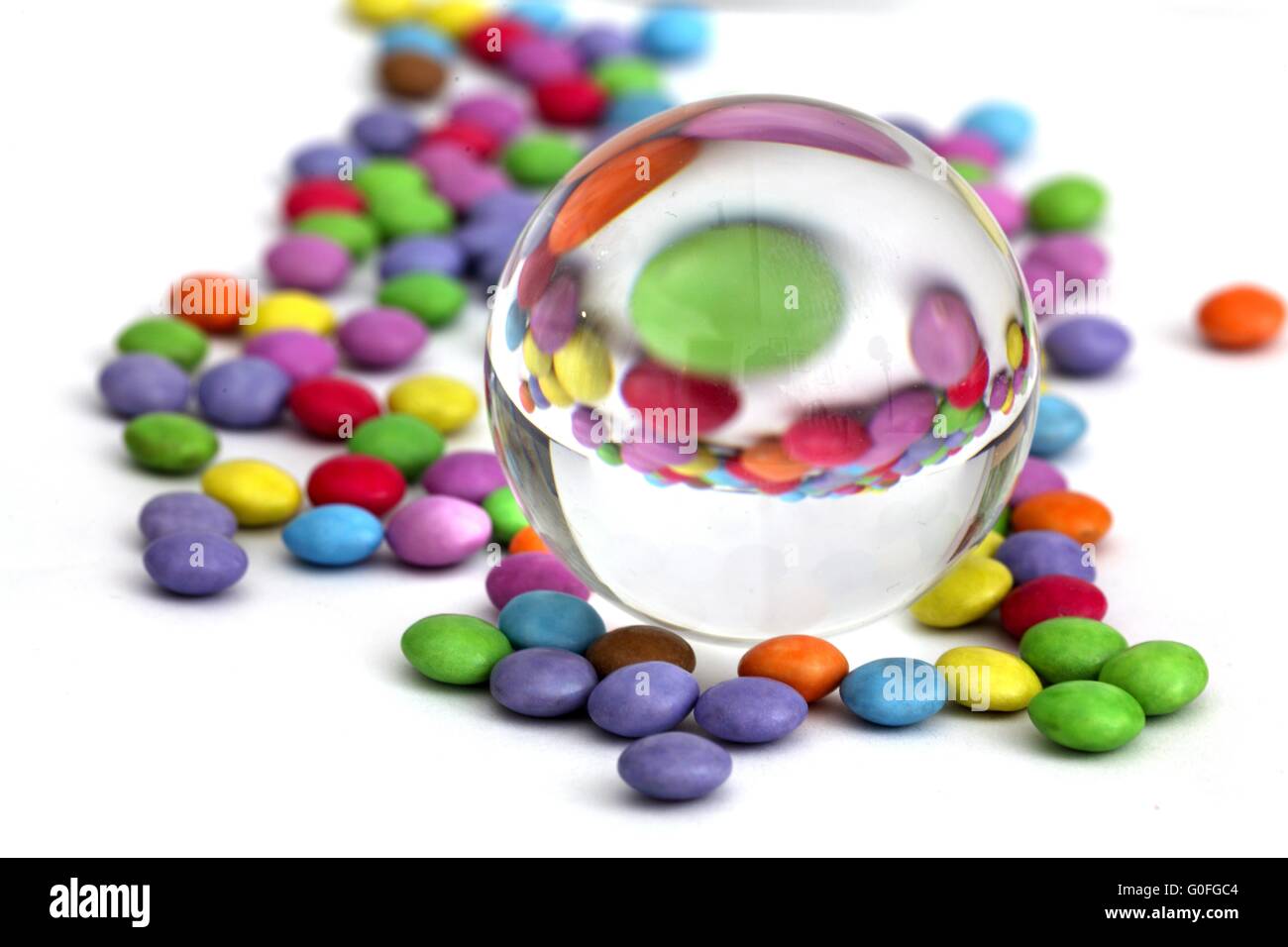 Round coloured sweets hi-res stock photography and images - Alamy
