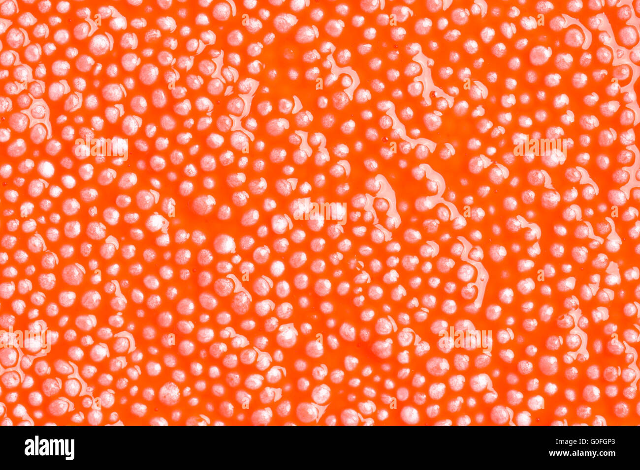 Colorful background - textured orange plasticine Stock Photo - Alamy