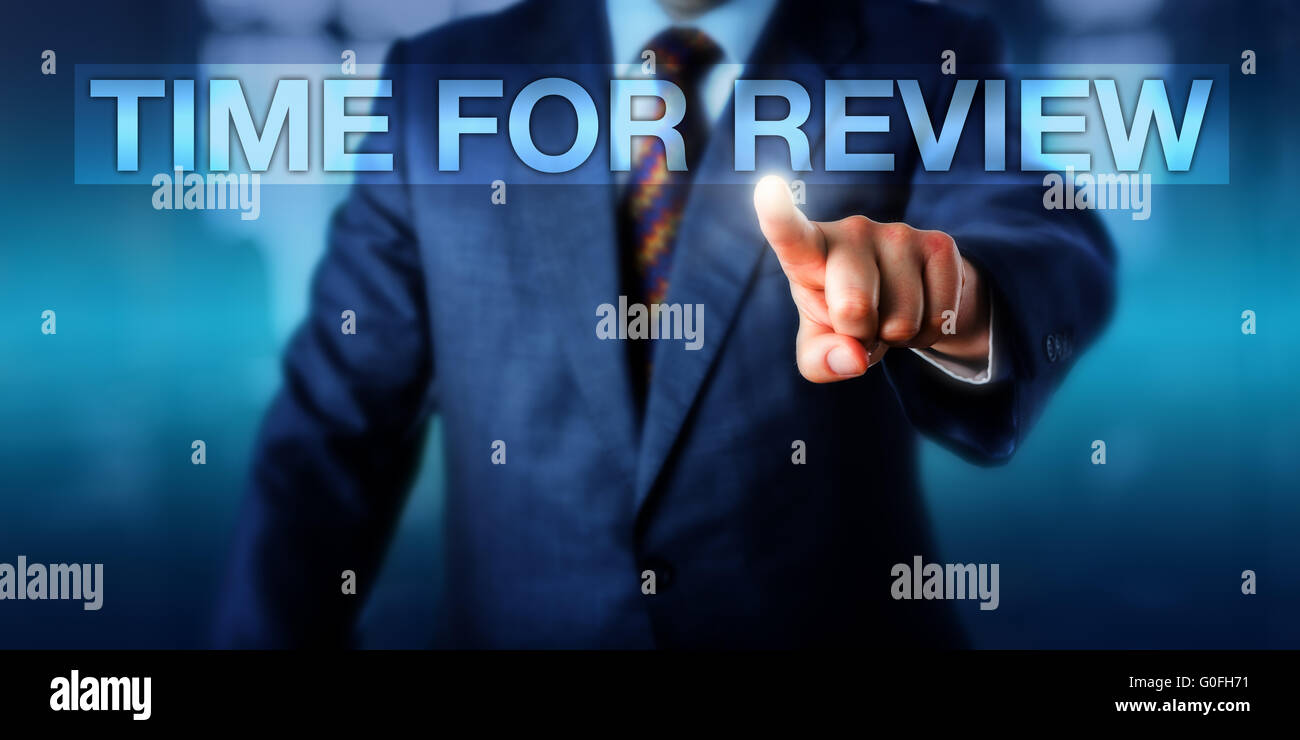 HR Manager Pressing TIME FOR REVIEW Stock Photo - Alamy