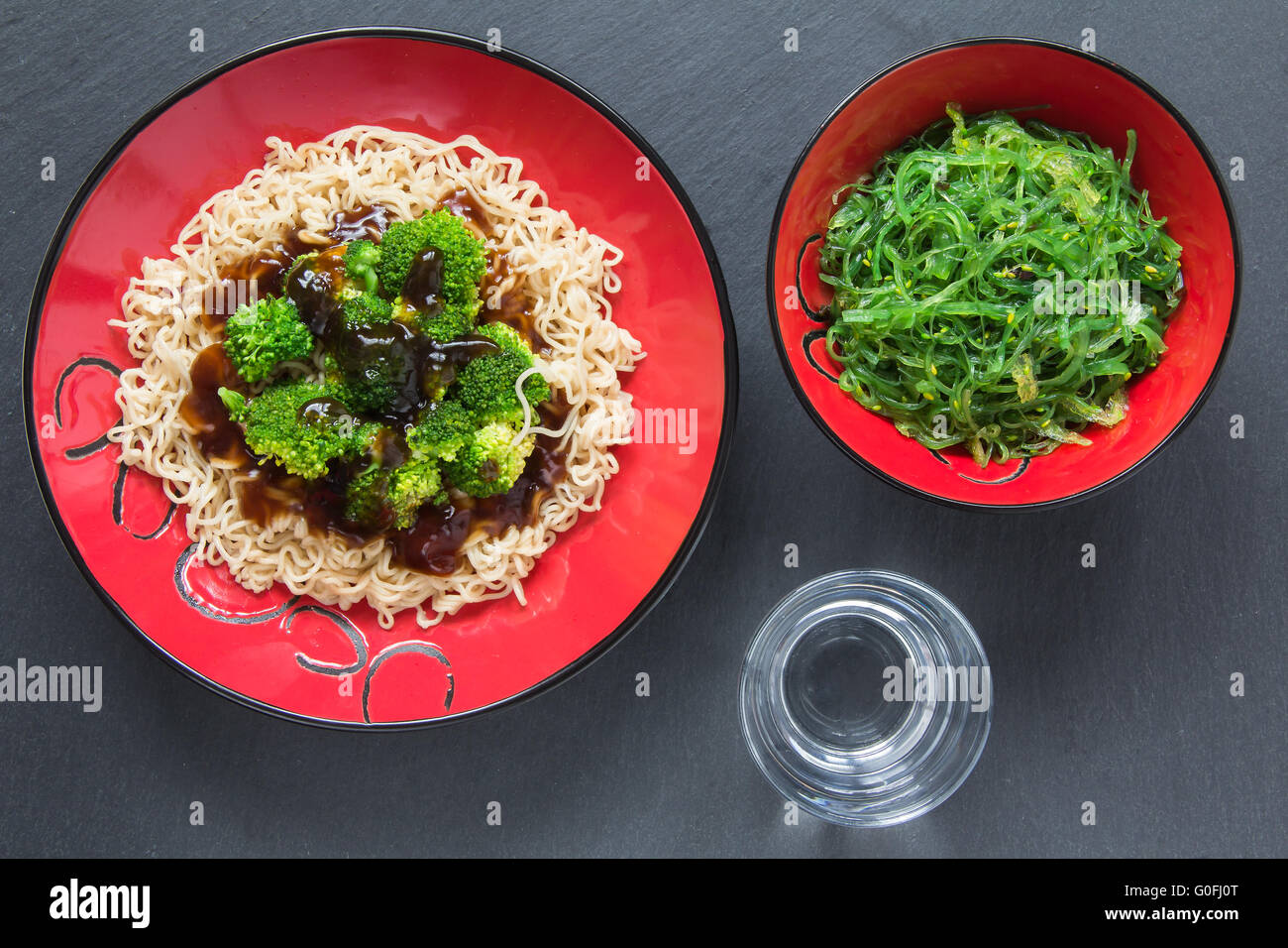 Brokkolie seaweed salad and water 02 Stock Photo - Alamy