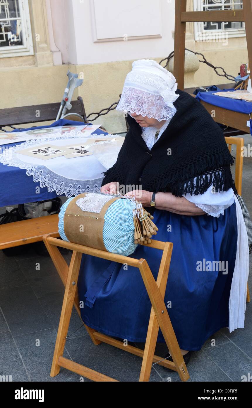 Woman hands embroider bobbin lace hi-res stock photography and images ...