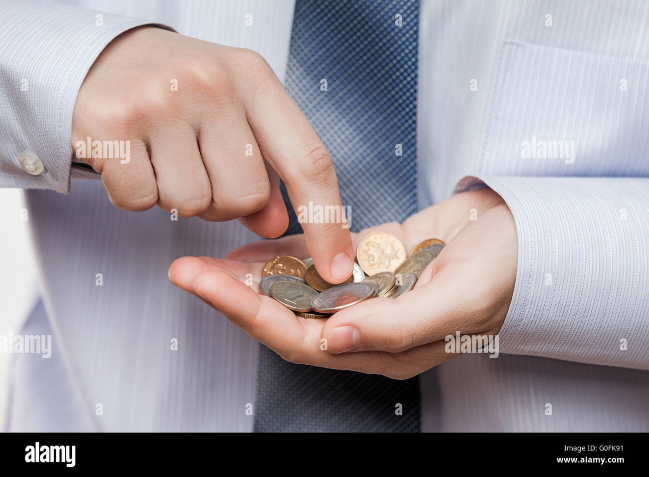 Counting money small change hi-res stock photography and images - Alamy