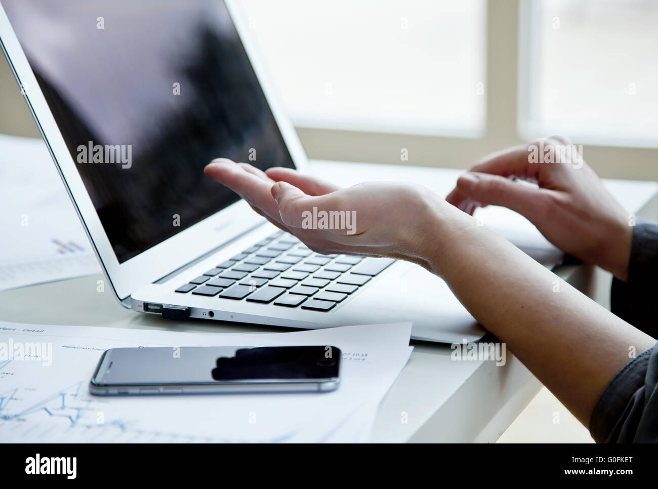 office work on notebook Stock Photo - Alamy