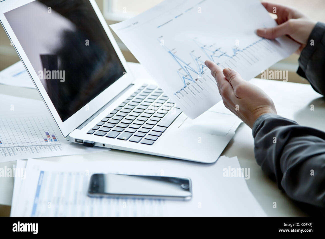 office work on notebook Stock Photo - Alamy