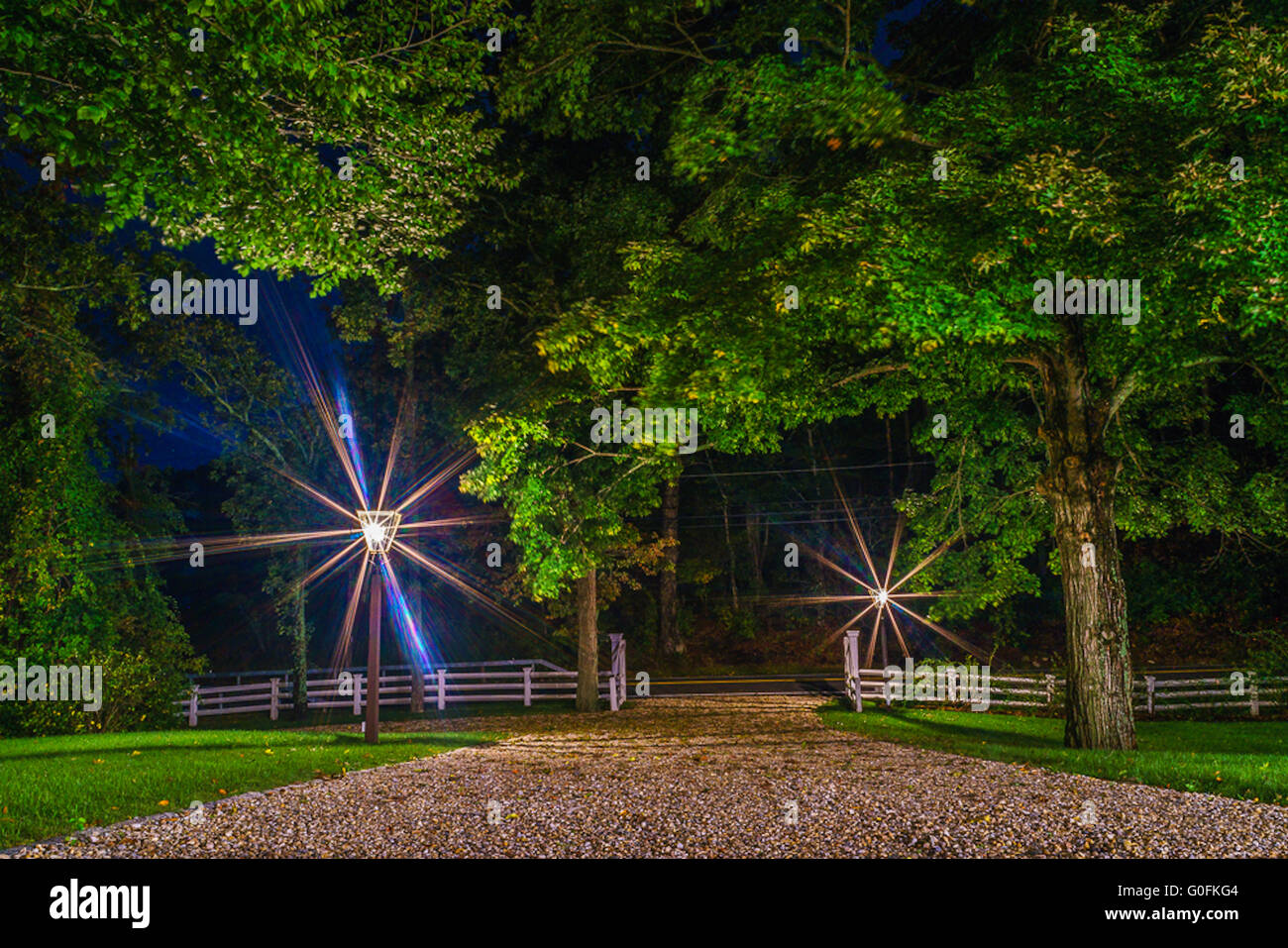 New England driveway lit at night Stock Photo - Alamy