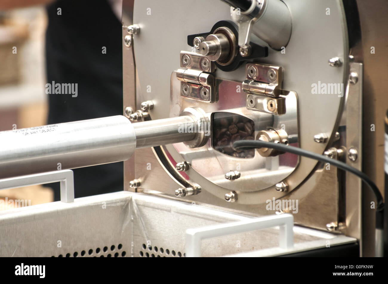 Professional machine for grinding coffee beans Stock Photo - Alamy