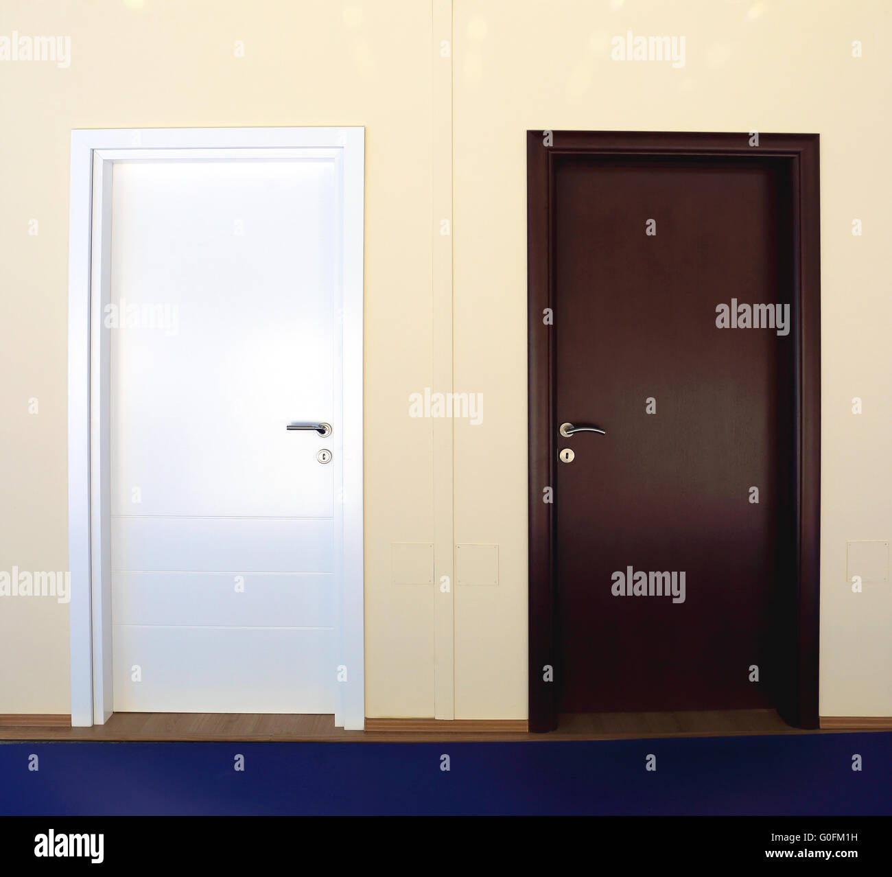 Two brown entrance doors hi-res stock photography and images - Alamy