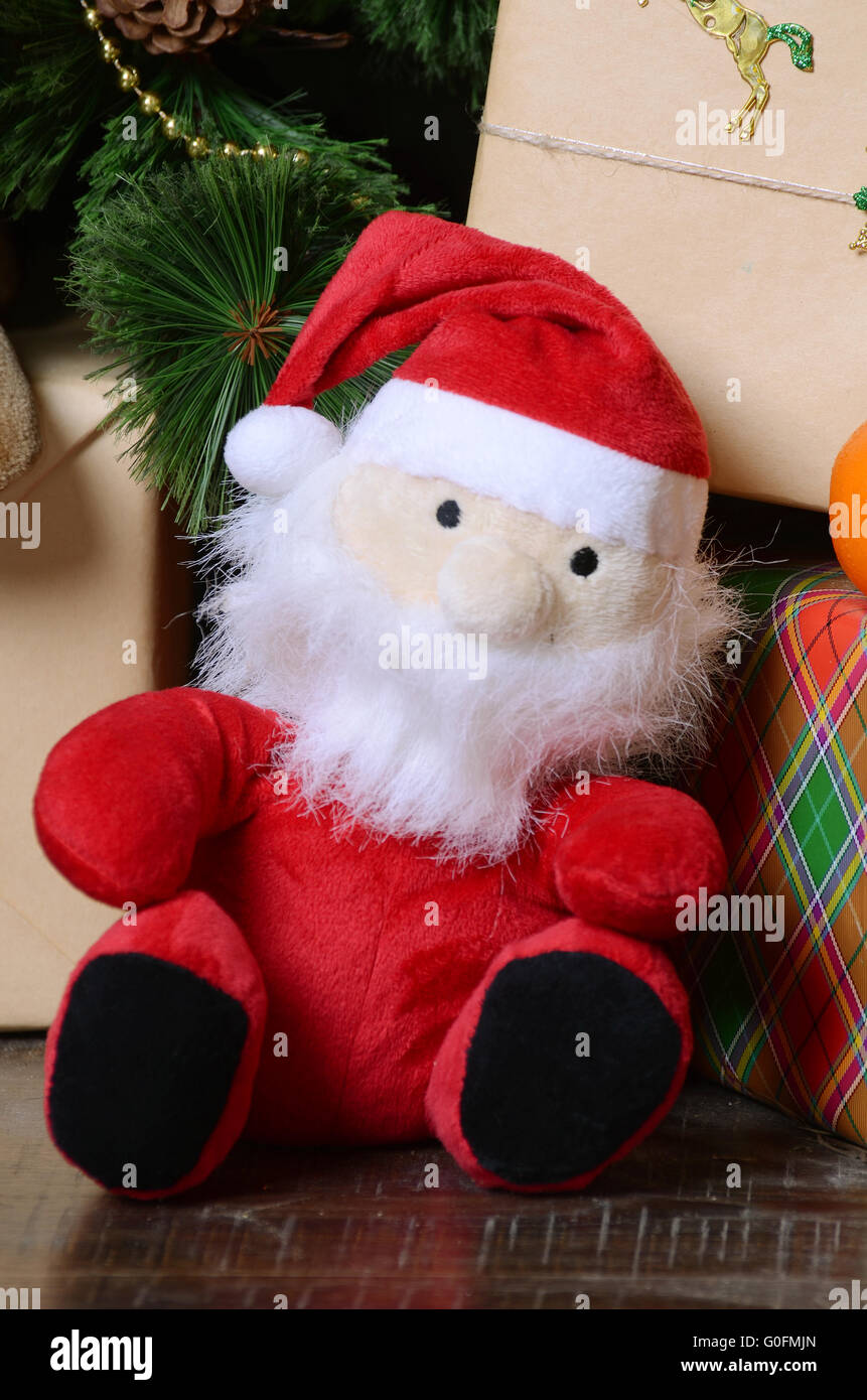 Santa Claus puppet and Christmas tree Stock Photo - Alamy