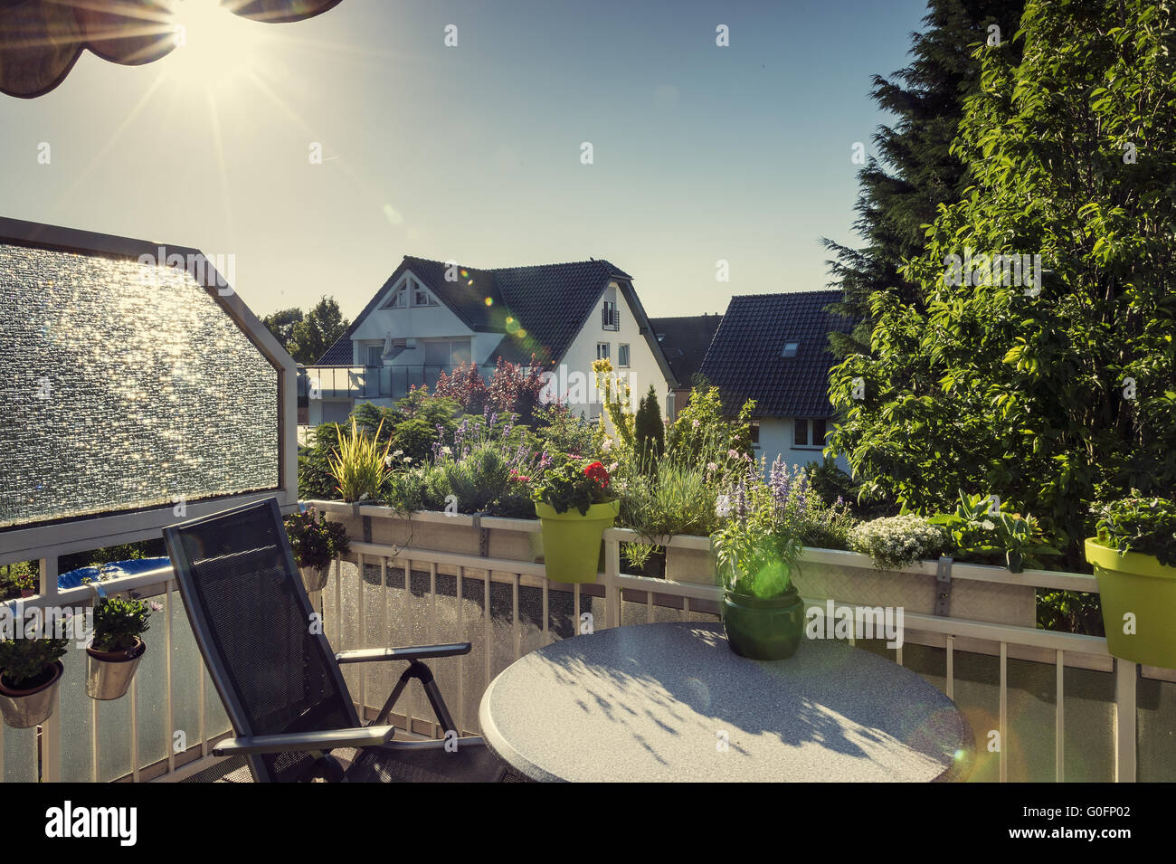 Balcony in the morning sun Stock Photo - Alamy