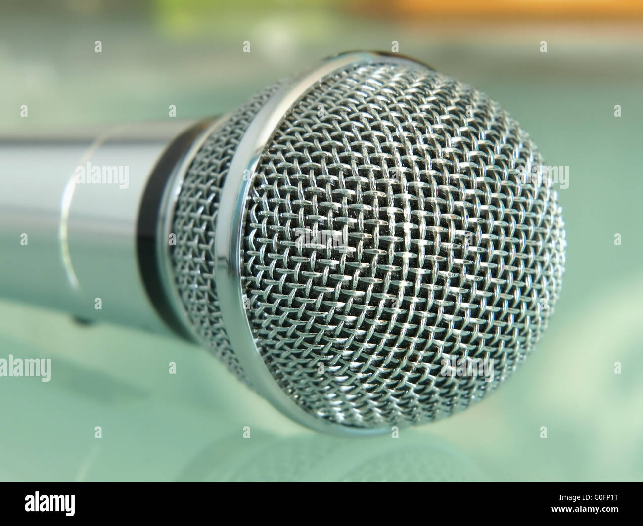 Silver metallic microphone taken closeup Stock Photo - Alamy