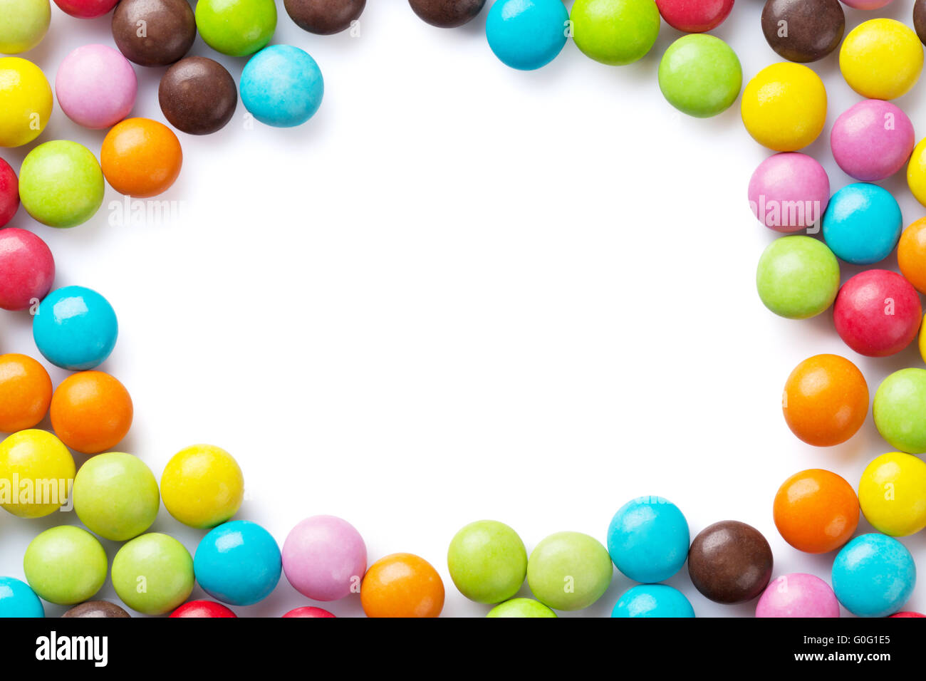 Colorful candies frame. Isolated on white background Stock Photo - Alamy