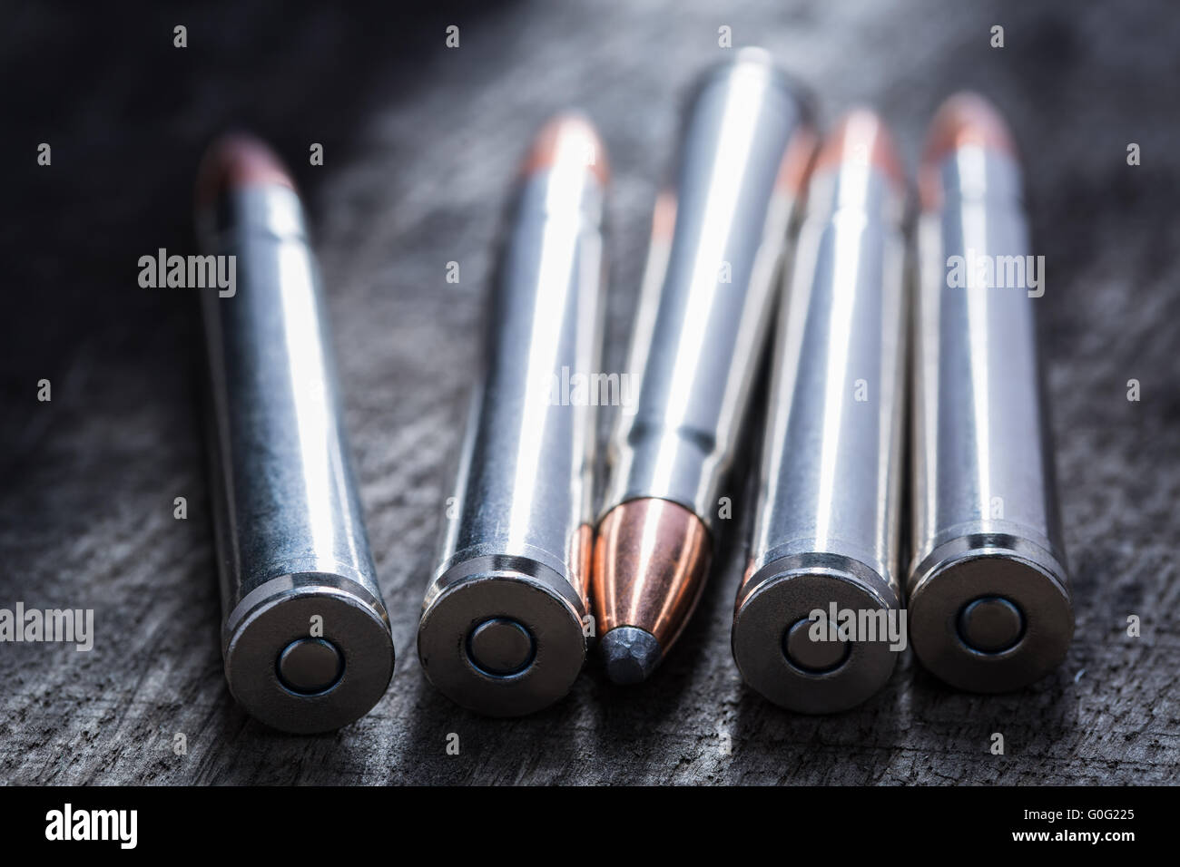 Cartridges silver with copper large-caliber bullets Stock Photo - Alamy