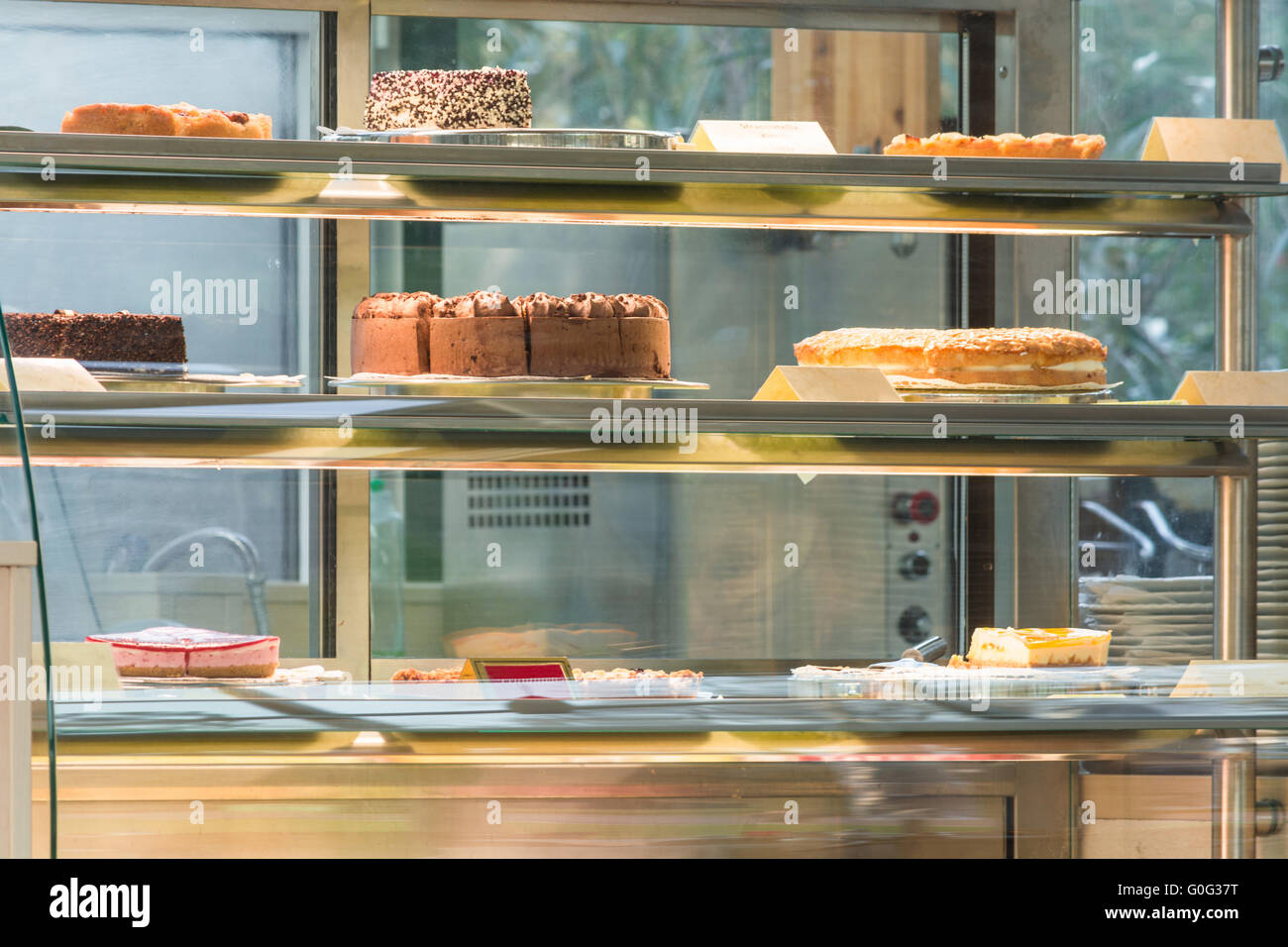 Cake in a glass case Stock Photo - Alamy