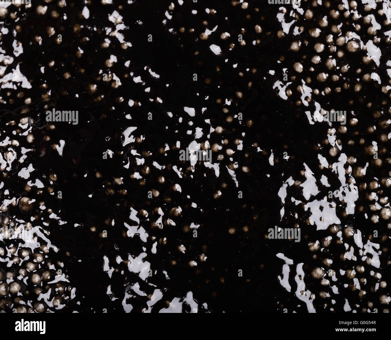 Colorful background - textured black plasticine Stock Photo - Alamy