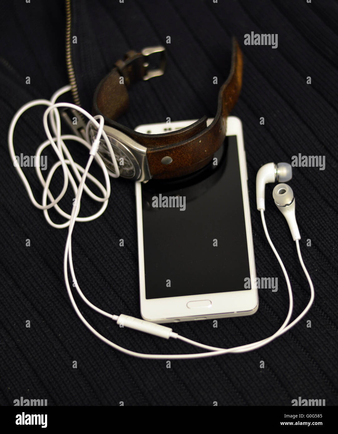 Smartphone and retro watch Stock Photo - Alamy