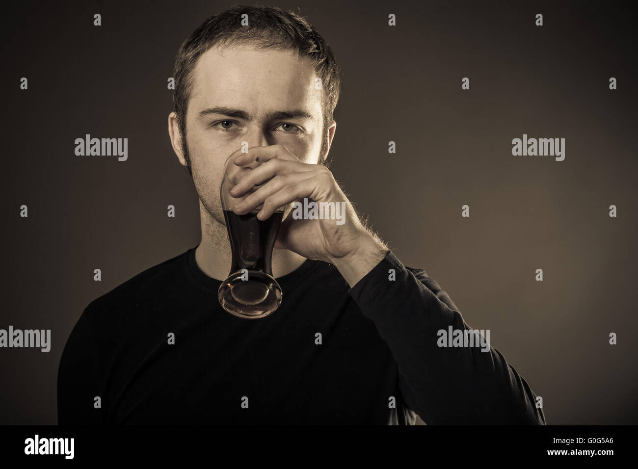 Man drinking beer Stock Photo - Alamy