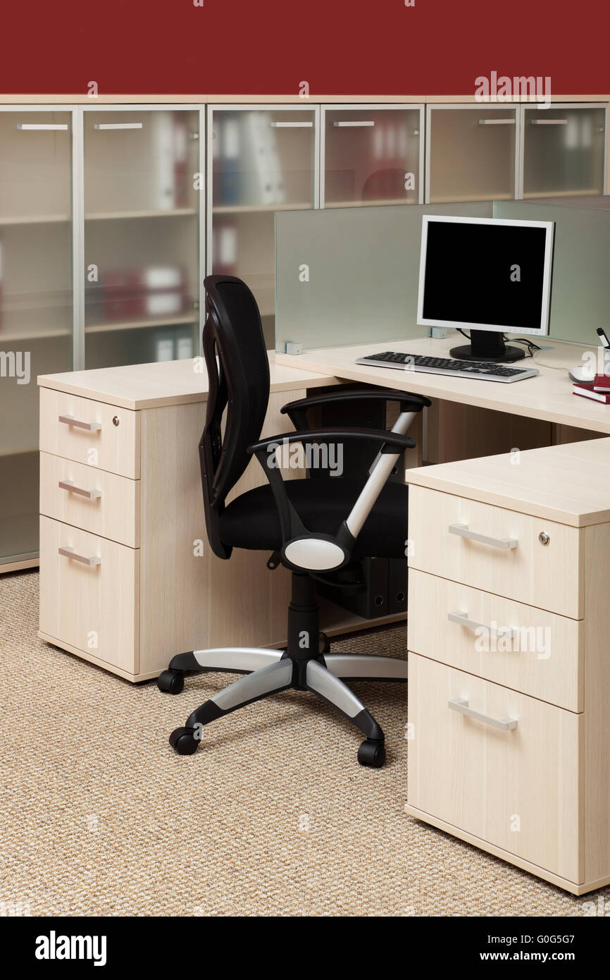 computers behind the glass in a modern office Stock Photo - Alamy