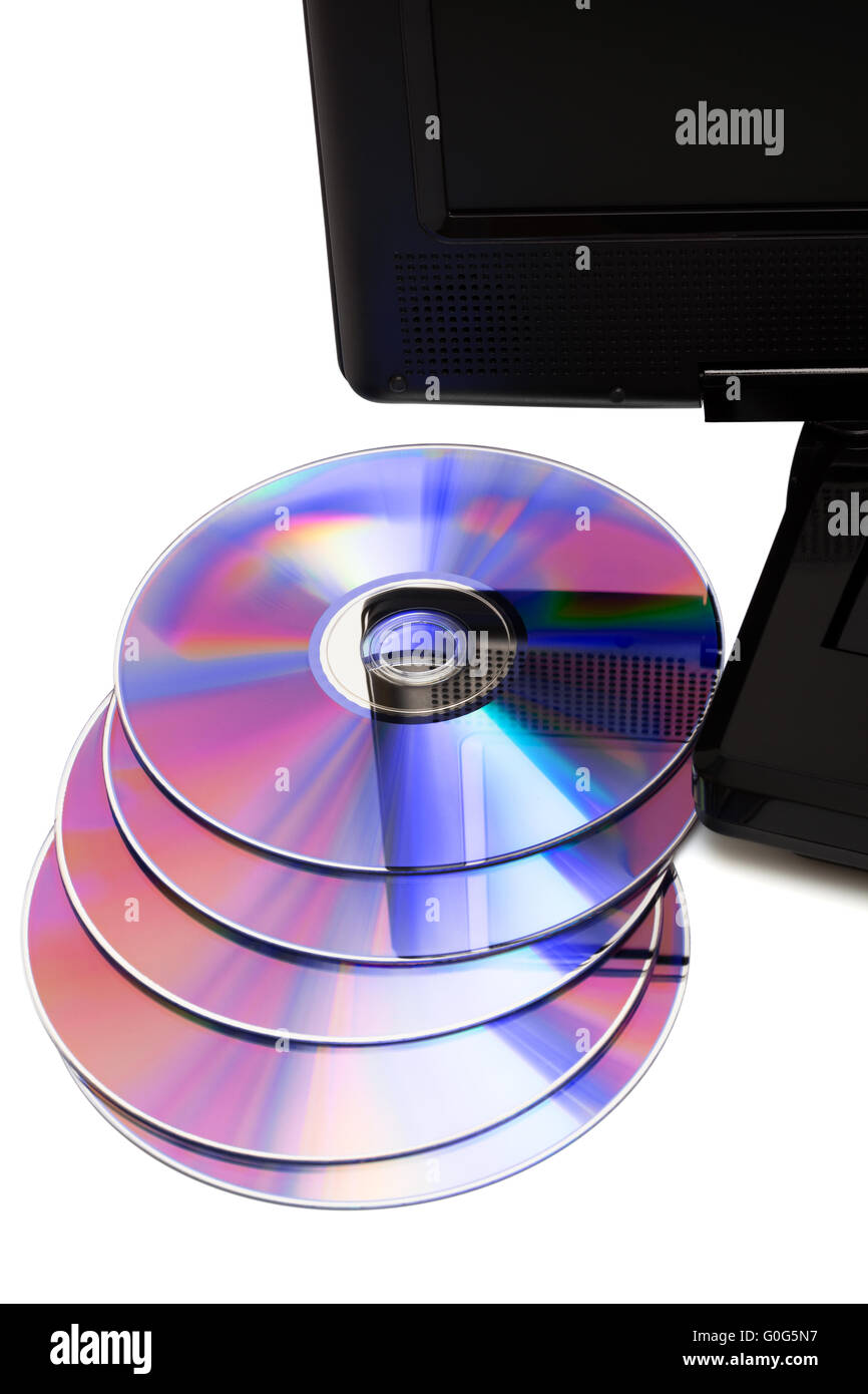 TV with a dvd disks on a white background Stock Photo - Alamy