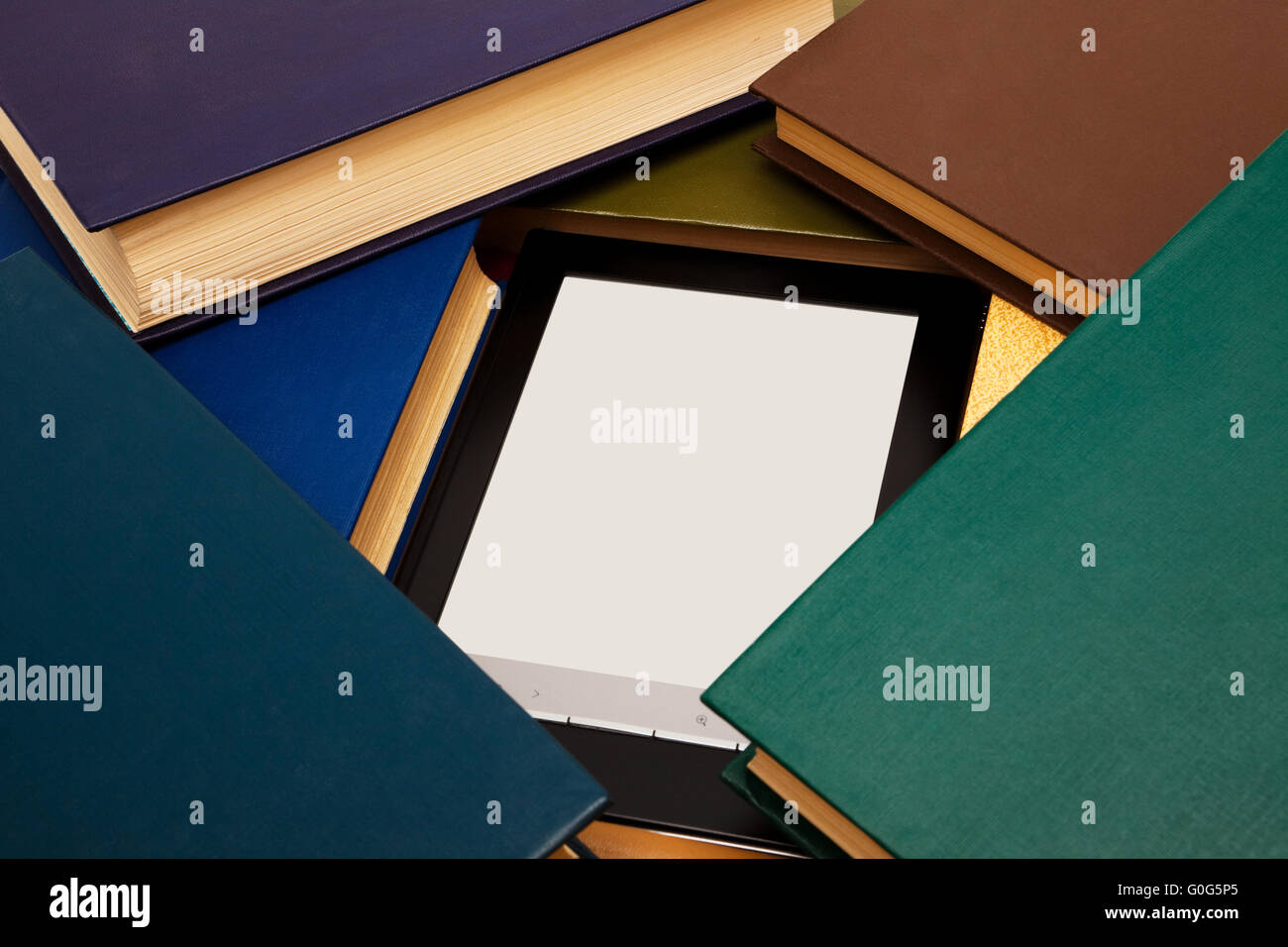 old books and the modern reader a close-up Stock Photo - Alamy