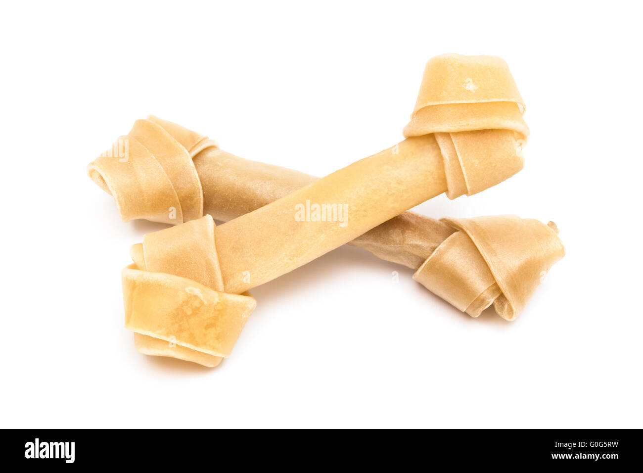 Artificial a bone for a dog with vitamins Stock Photo - Alamy