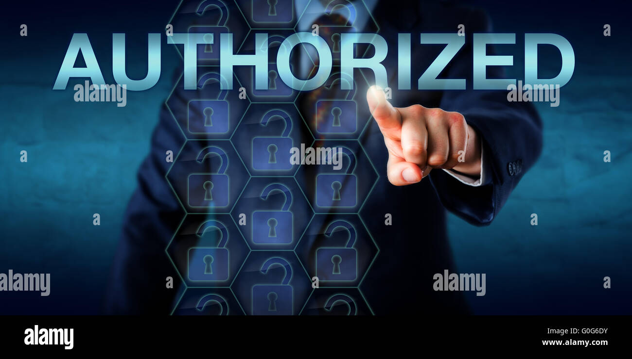 Corporate User Touching AUTHORIZED Onscreen Stock Photo - Alamy