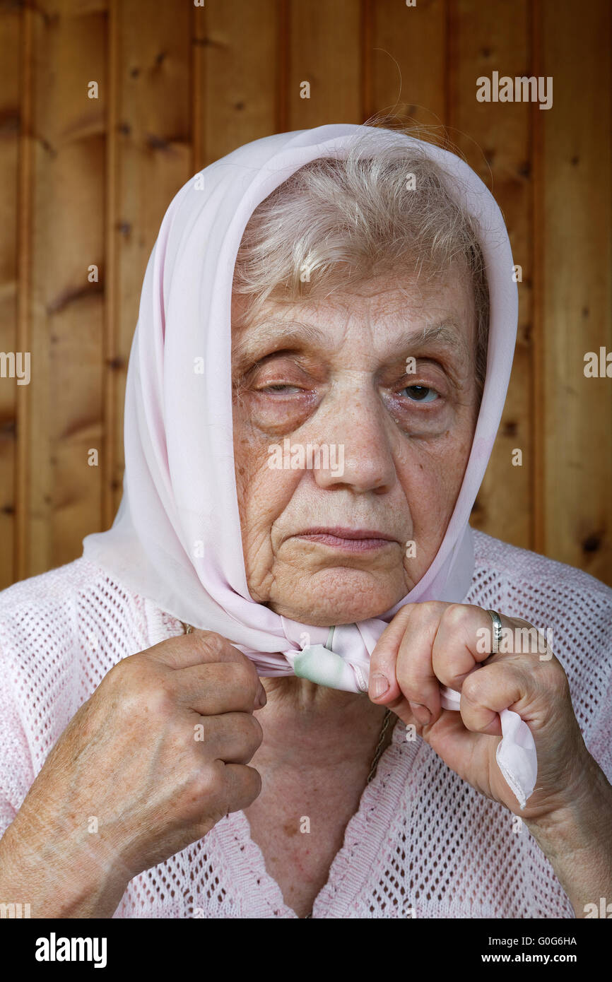 Portrait of the old woman in a kerchief close up Stock Photo - Alamy