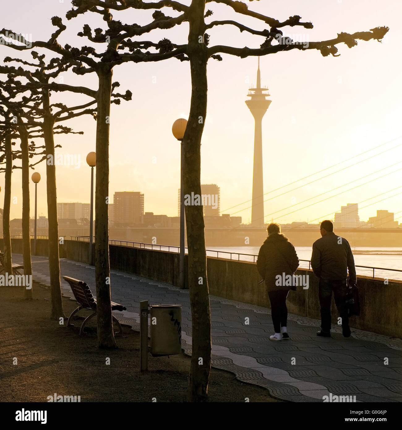 Two people on the Rhine promenade, Duesseldorf, North Rhine-Westphalia ...