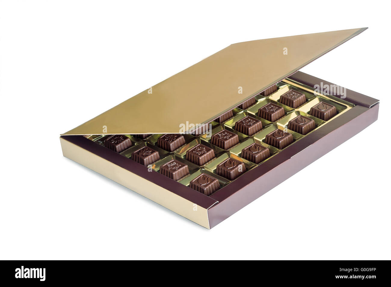 An open box of chocolates on a white background Stock Photo - Alamy