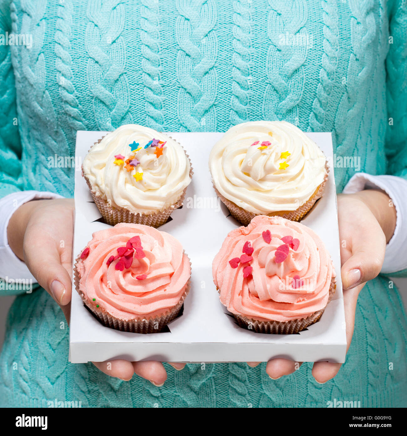 Hands holding cupcake one birthday hi-res stock photography and images ...