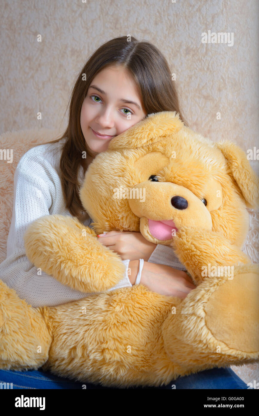 Girl and toy Stock Photo - Alamy