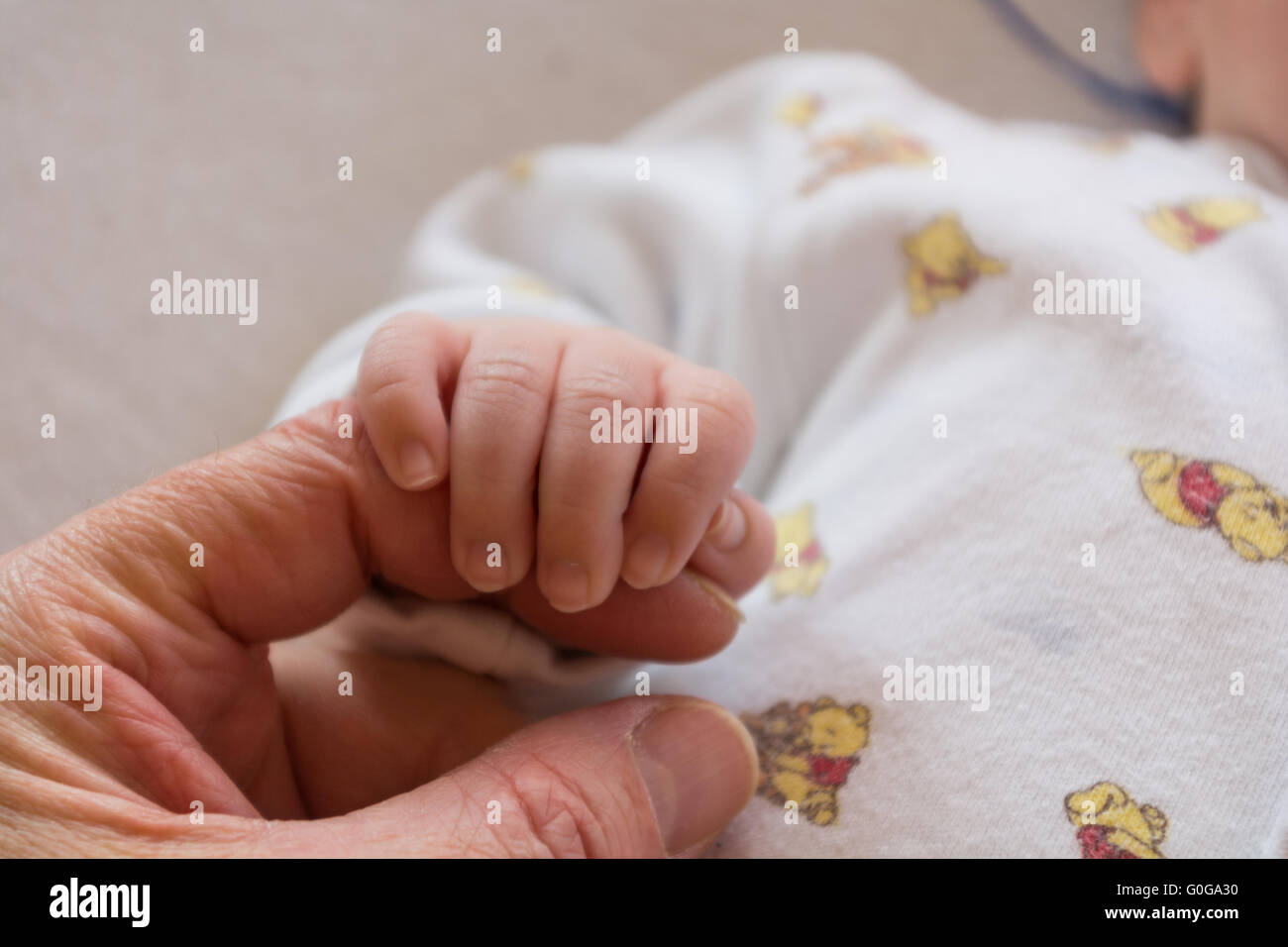 Adult hand reaching baby hand hi-res stock photography and images - Alamy