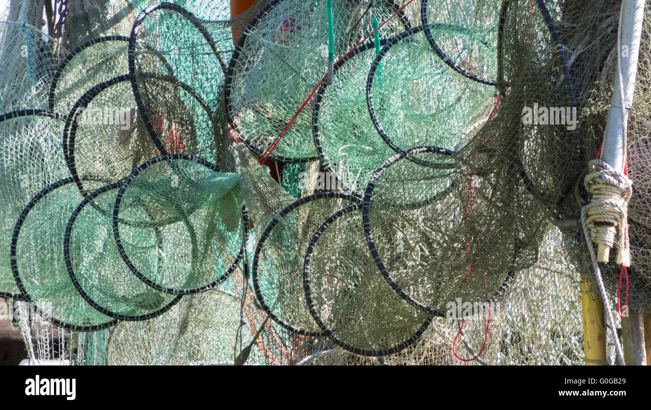 Fishing nets and fish traps Stock Photo - Alamy