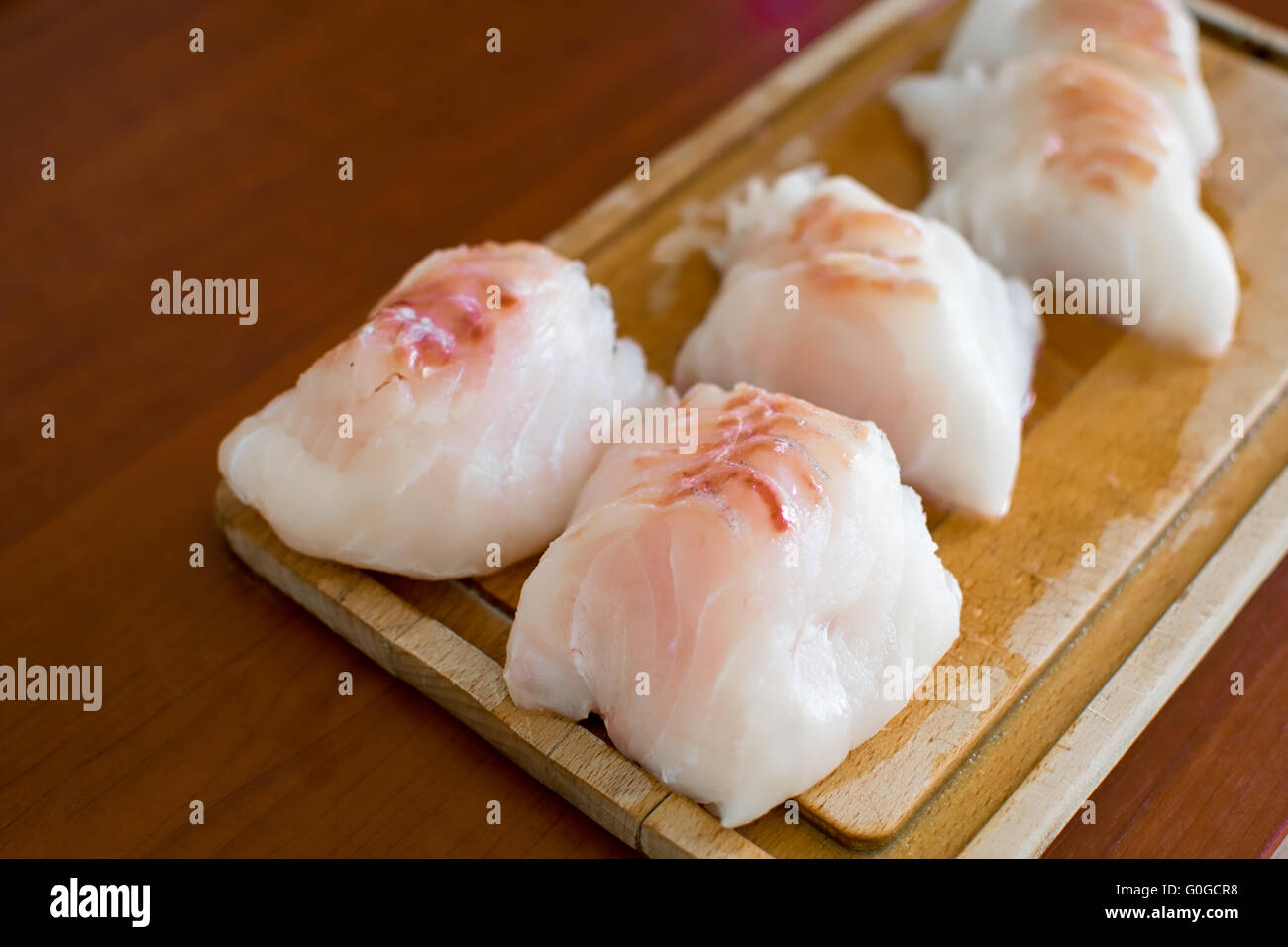 Raw fish flesh Stock Photo - Alamy